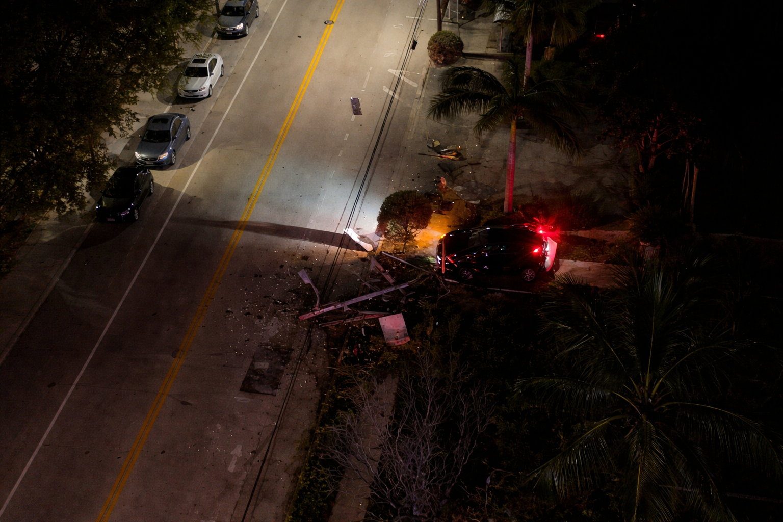 Stolen Ferrari crashes into utility pole during police chase in Miami
