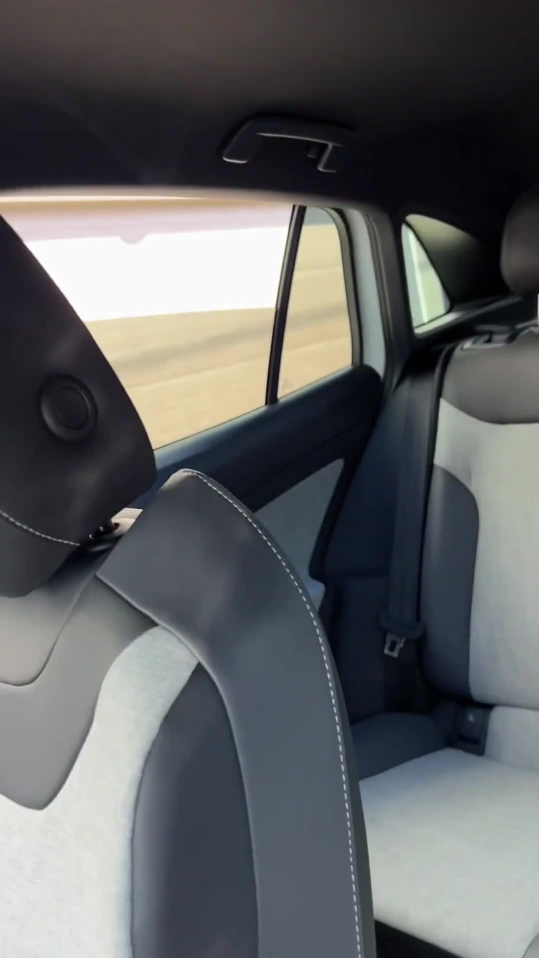 Weirdest car window switch. 3 buttons!