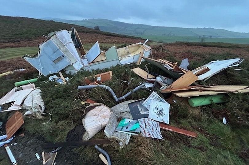 Fury as smashed-up caravan found dumped at North Wales beauty spot