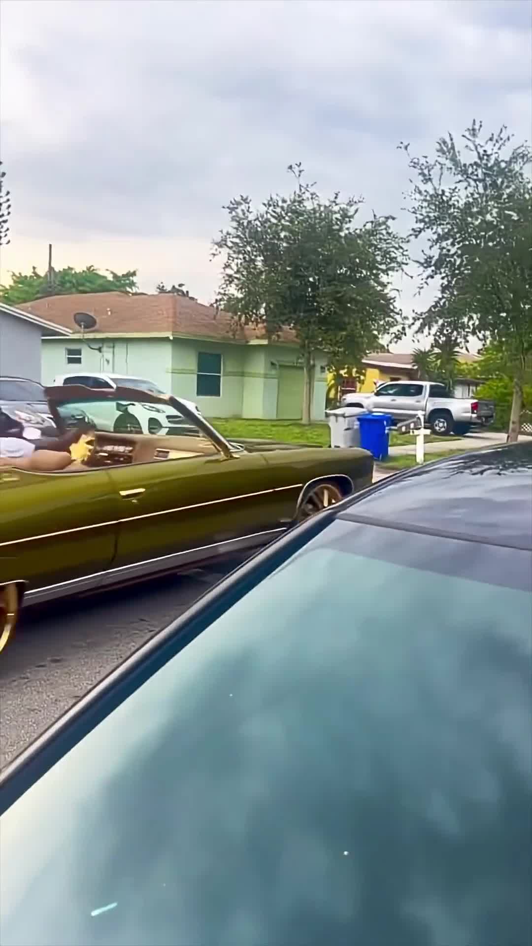 Nava in His Chevy Vert on Gold 26’s Slidin thru the Hood