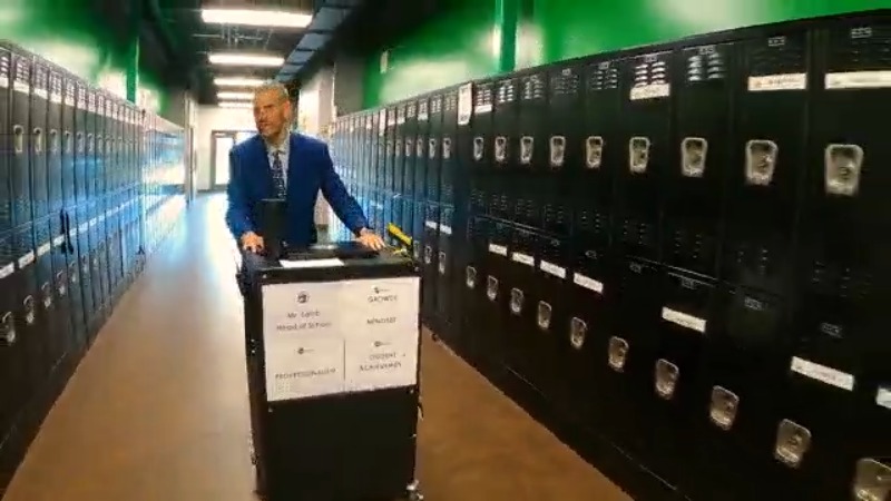 Baton Rouge principal trades office for a cart