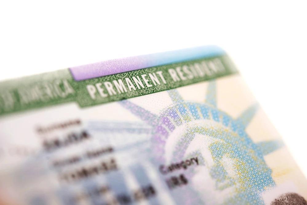Group of green card holders sues federal government over citizenship delays