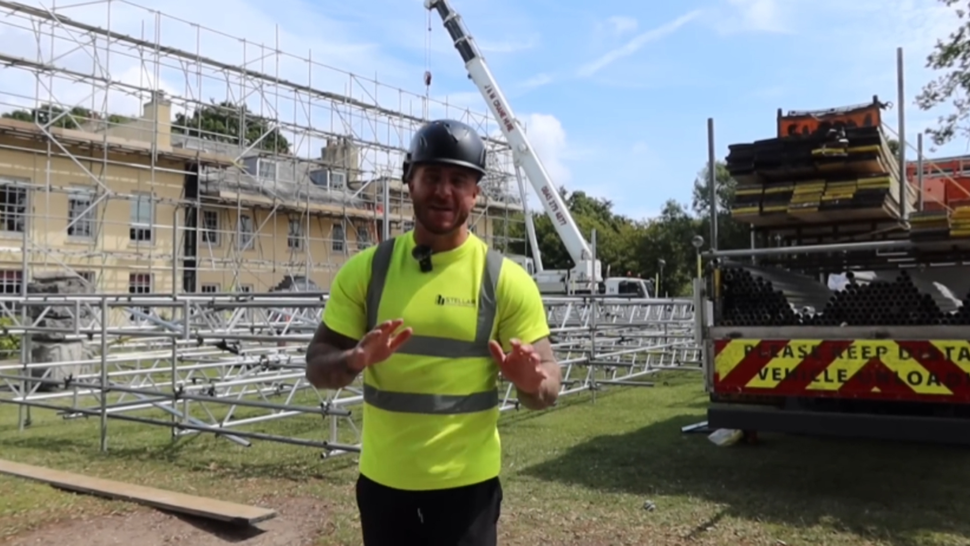 Putting all the scaffolding beams sections on the roof