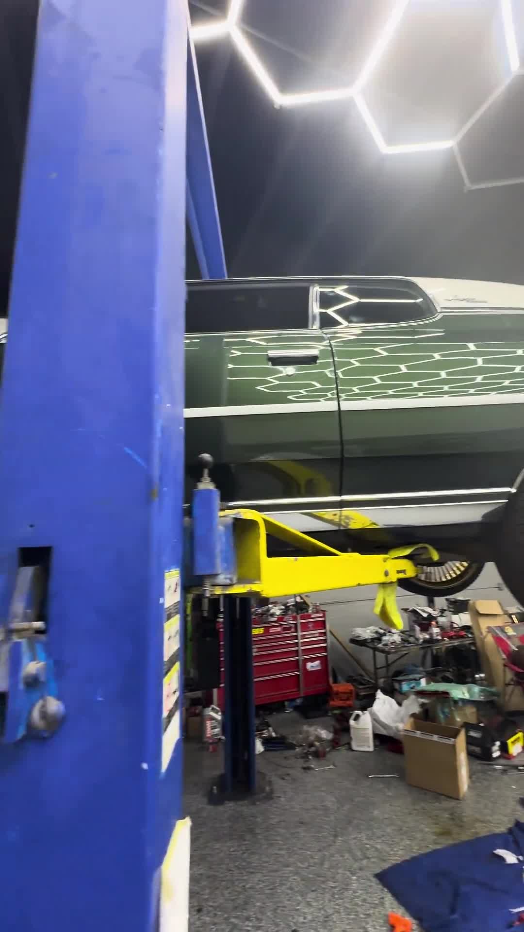 BallGreezy’s 71 Chevy donk on gold 24” Daytons at BlueMagic Built