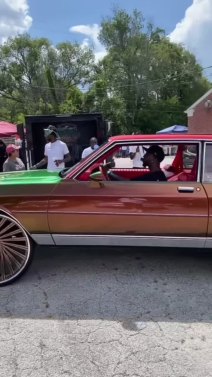 Outrageous 2-door box Chevy on 28’s DUBs riding
