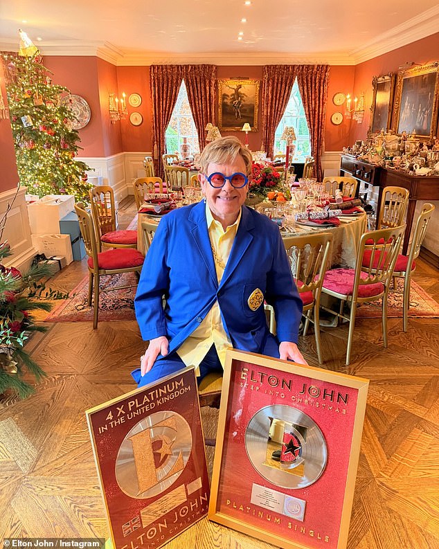 Sir Elton John, 78, beams as he celebrates Step Into Christmas going ...