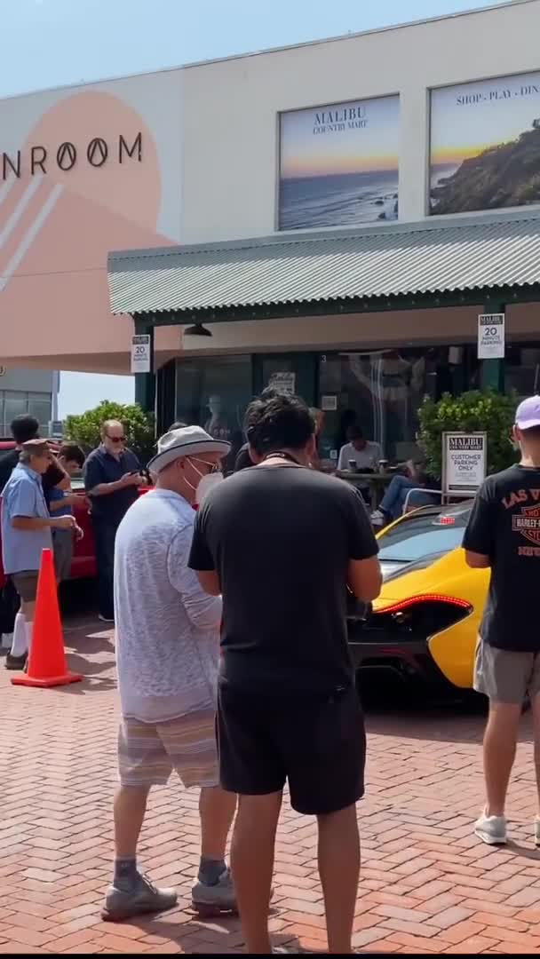 Jay Leno in a McLaren P1 and a purple McLaren 720S supercar