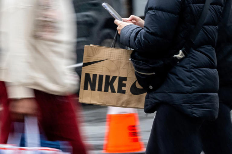 Apple CEO Tim Cook buys $3 million of Nike shares. The stock is rising.