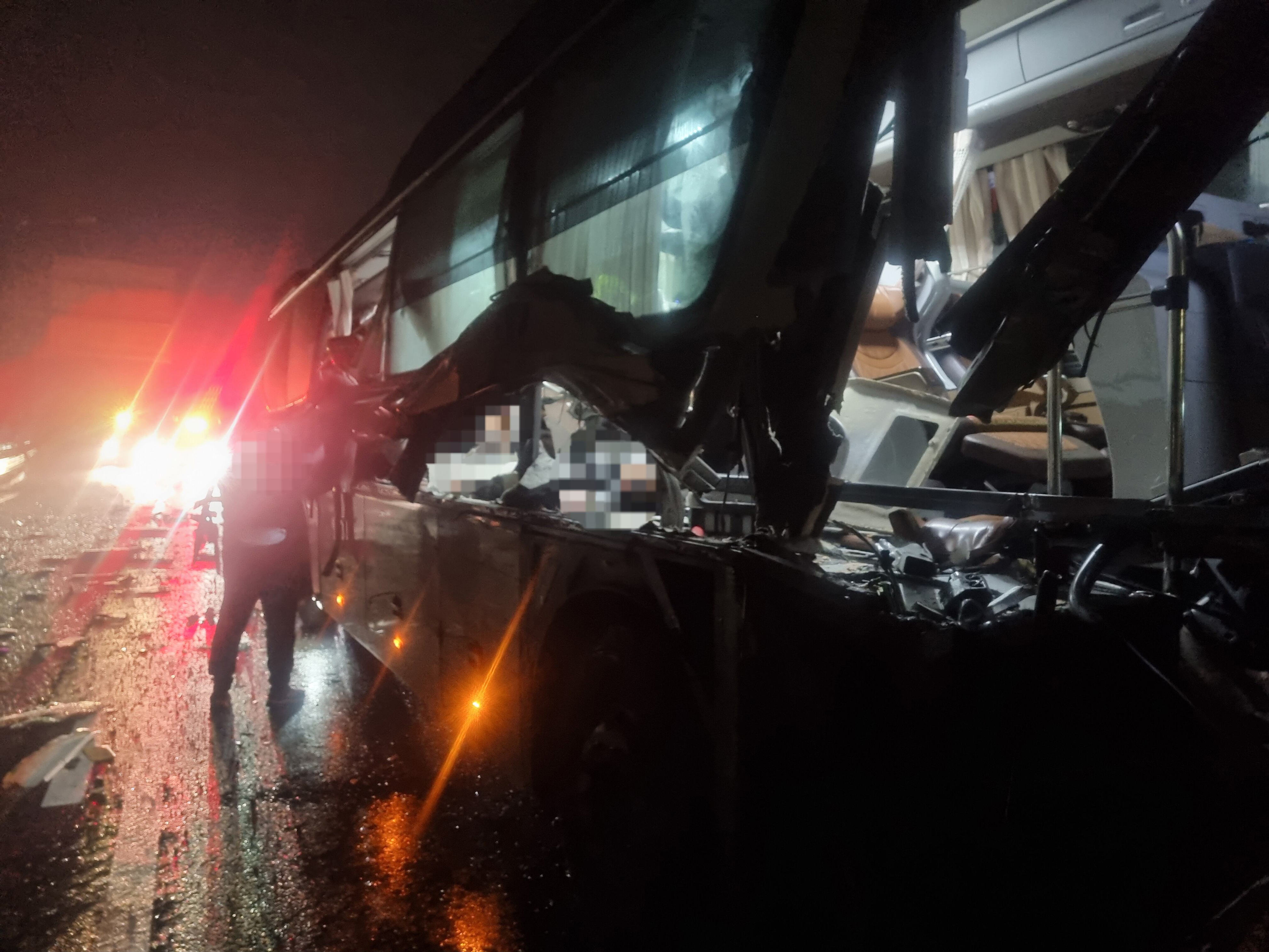 Intercity bus-cargo truck collision injures nine