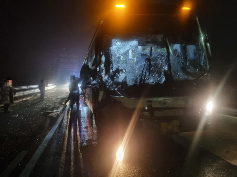 Intercity bus-cargo truck collision injures nine