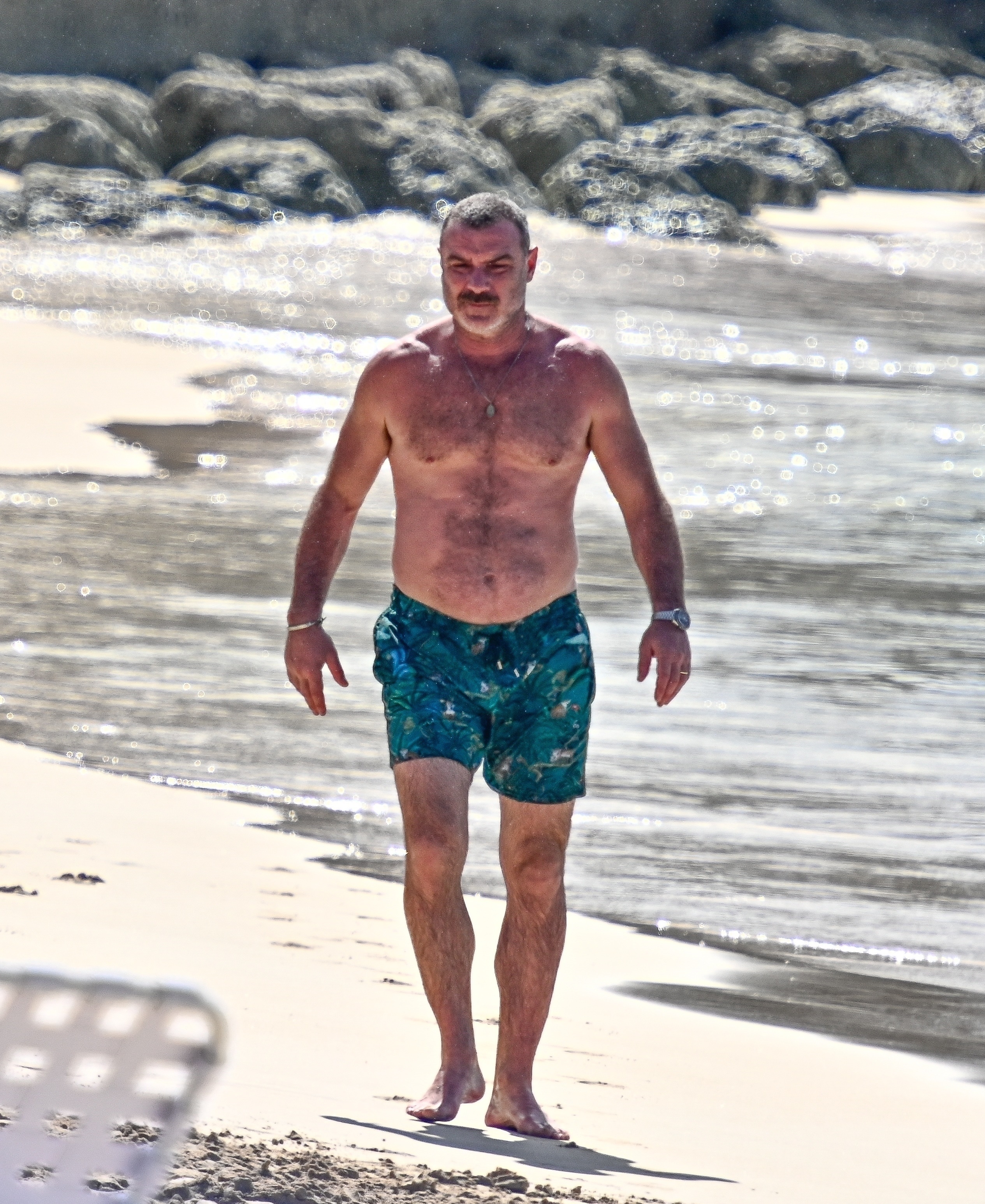 Shirtless Liev Schreiber flaunts fit physique in Barbados after mystery ...