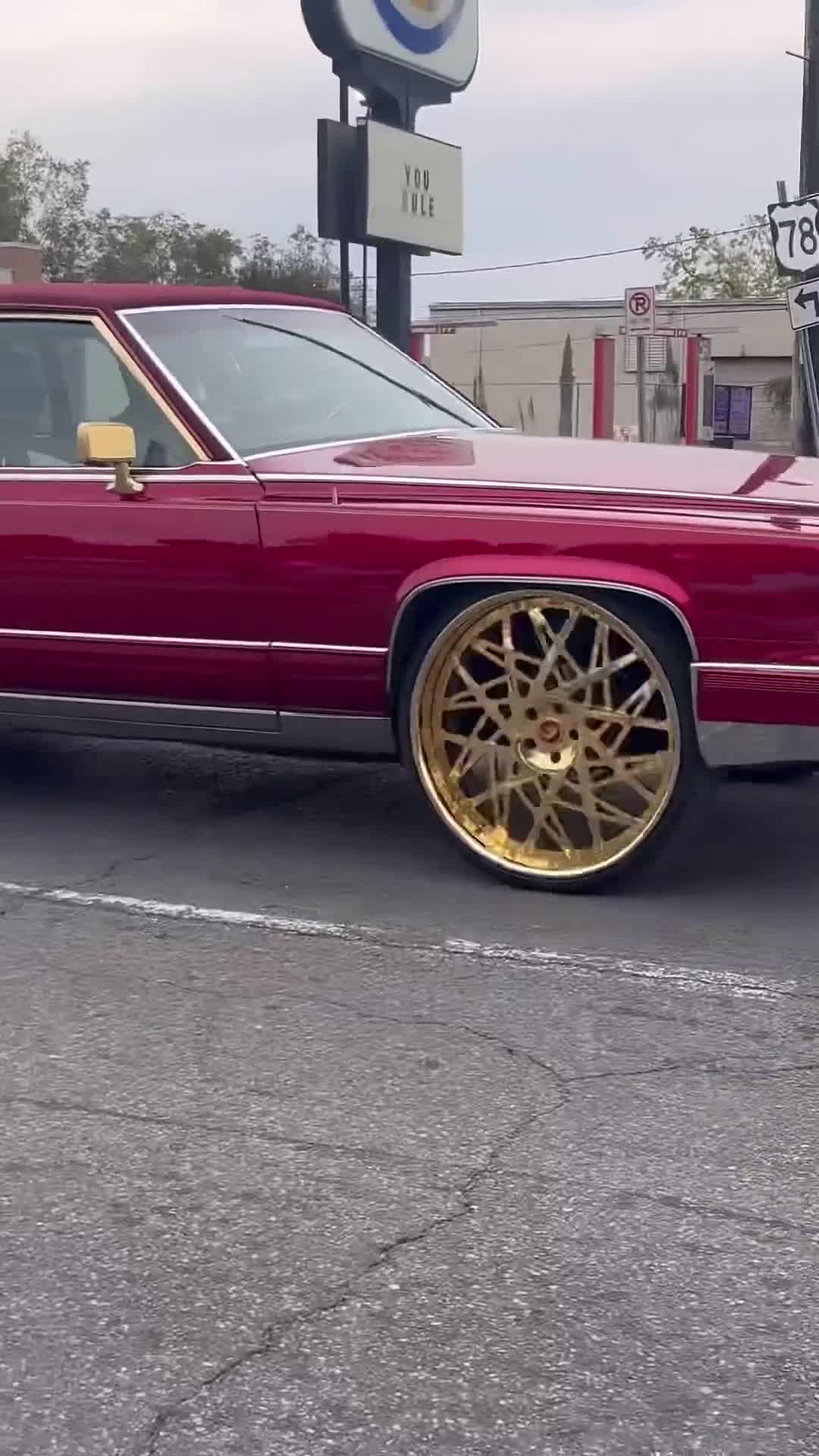 Candy Red Cadillac on Gold 26’s Riding