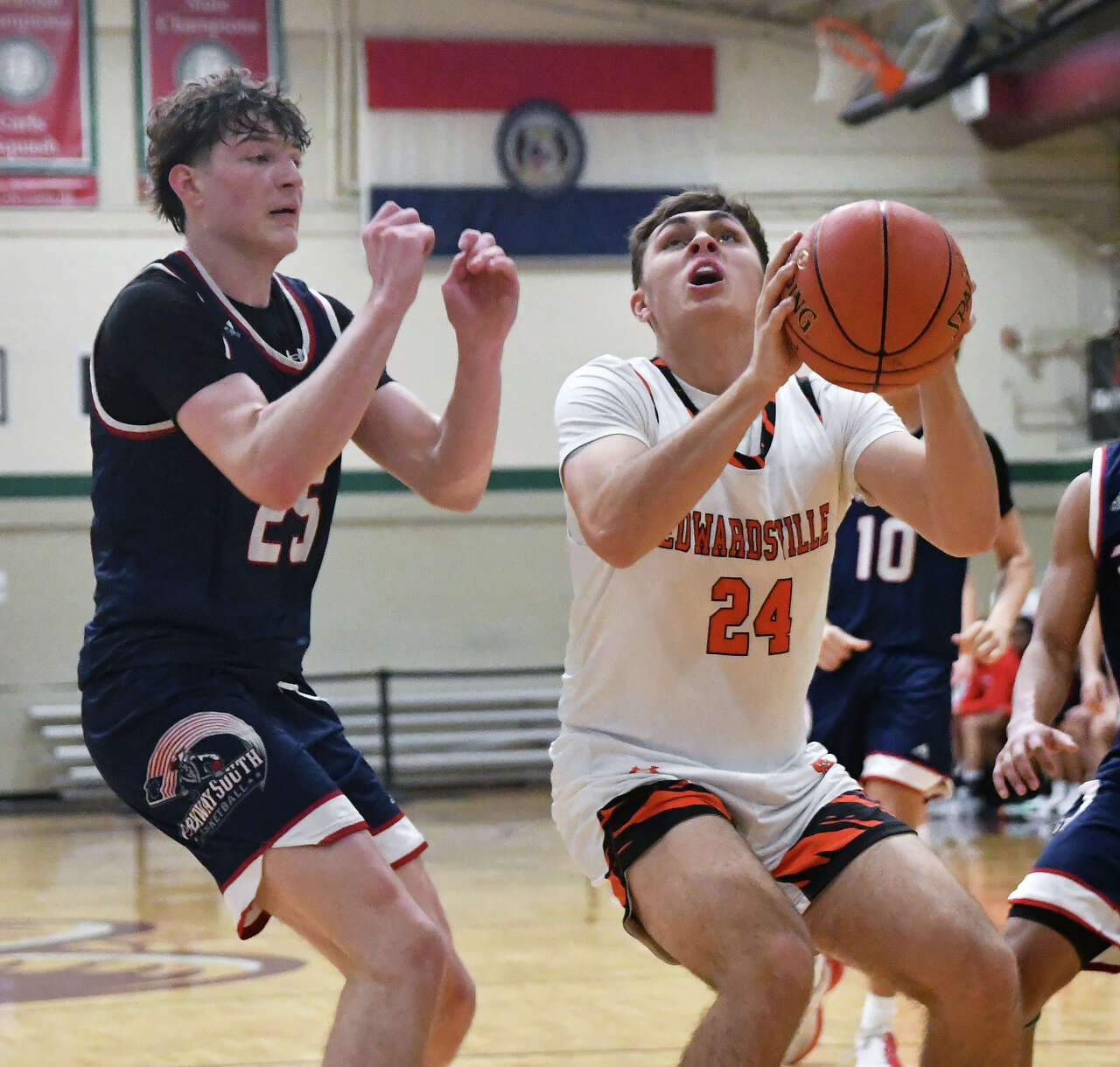 Defending champion Tigers open tournament with a win