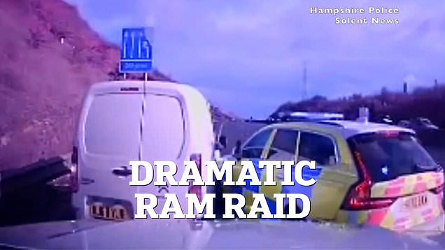 Dramatic moment police ram runaway van off motorway