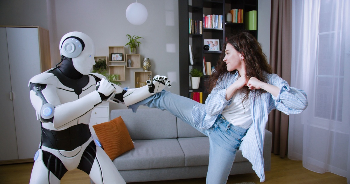 Watch a humanoid fighting robot take a direct jump kick to the chest ...