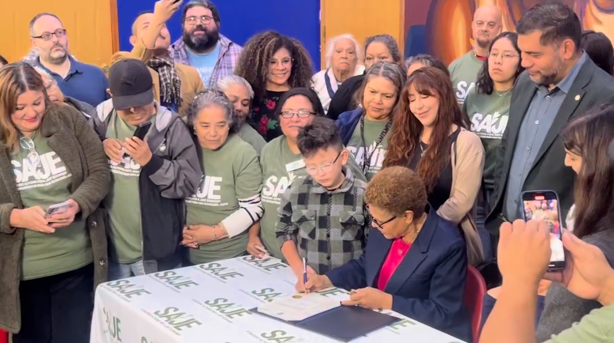 Bass signs updated rent stabilization ordinance, which caps hikes at 4%