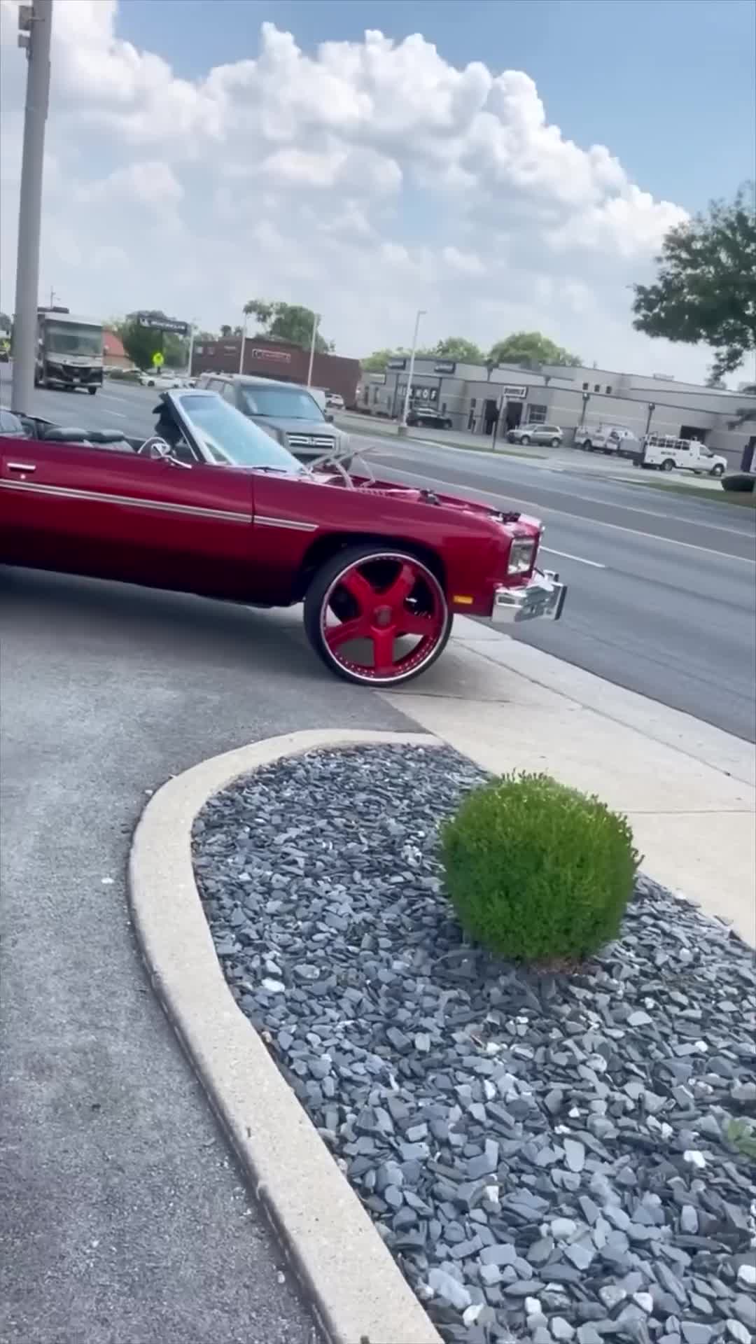 Red '75 Chevy vert on 30’s riding