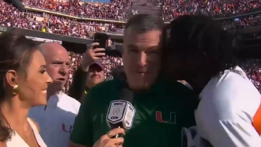 Michael Irvin explained 'Godfather kiss' for Mario Cristobal after ...