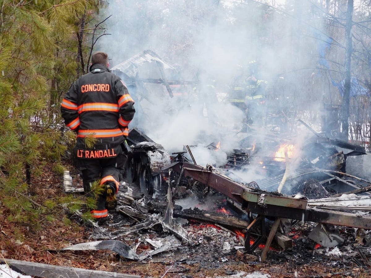 Concord firefighters extinguish burning camper at homeless camp off ...