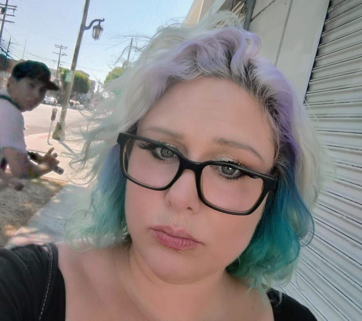 Woman found dead at freeway encampment identified