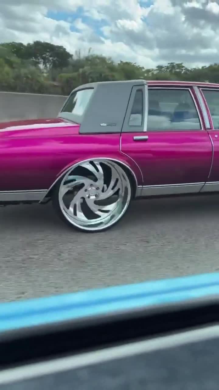 Box Chevy on 26’s riding on the highway