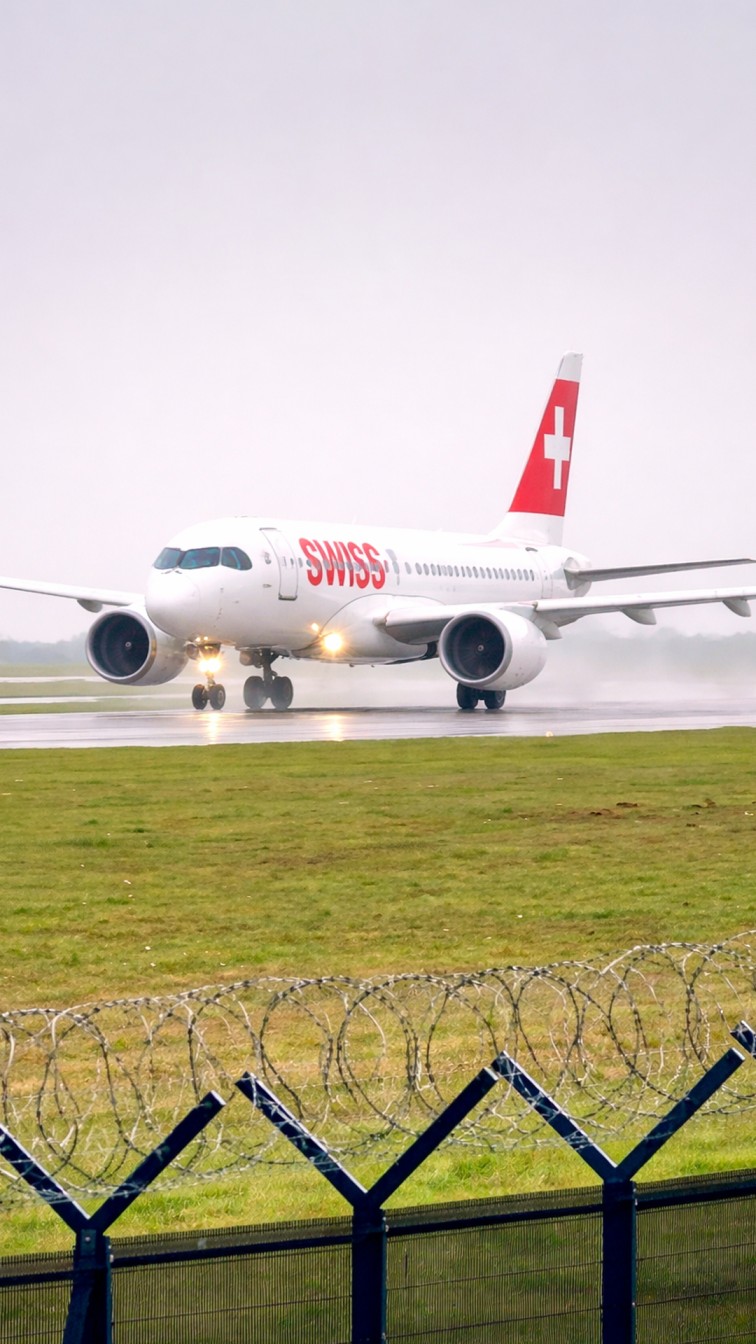 Loud Swiss A220 takeoff in cloudy weather