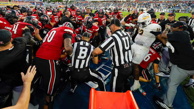 College football bowl game features sideline brawl in final minutes