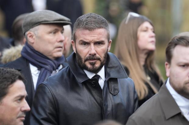 Sir David Beckham attends funeral of Stone Roses music legend