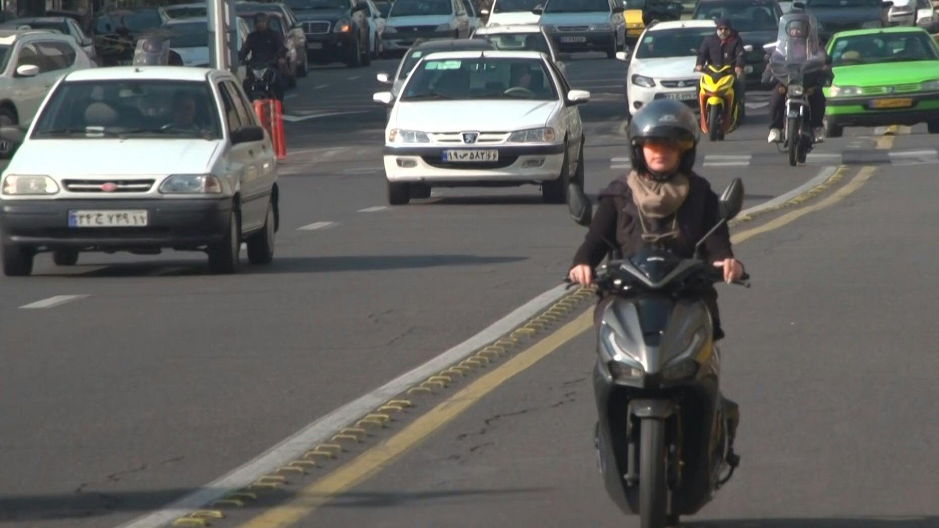 Iran's women bikers take the road despite legal, social obstacles