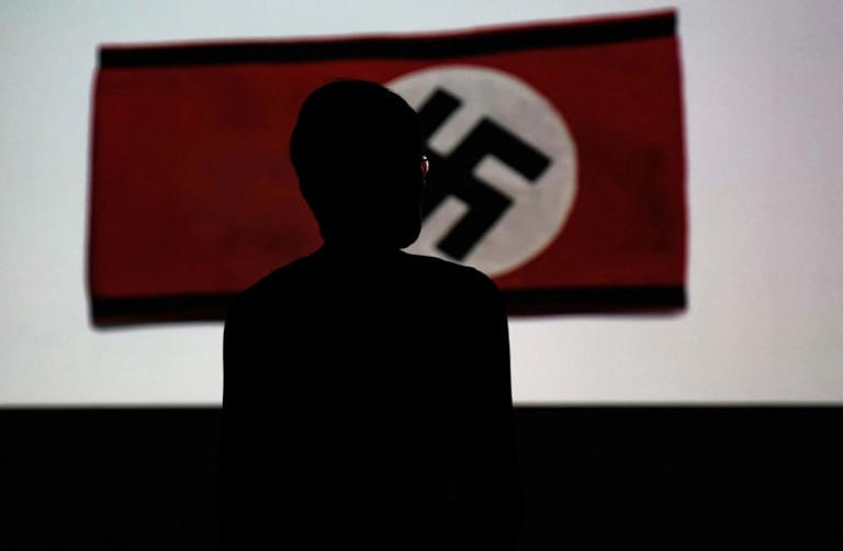 Australia cancels British national’s visa after Nazi symbol and hate ...