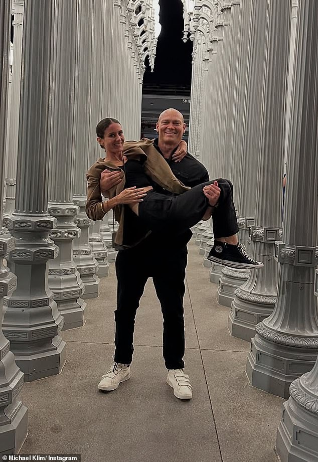 Christmas joy for Michael Klim as he gets engaged to partner Michelle Owen