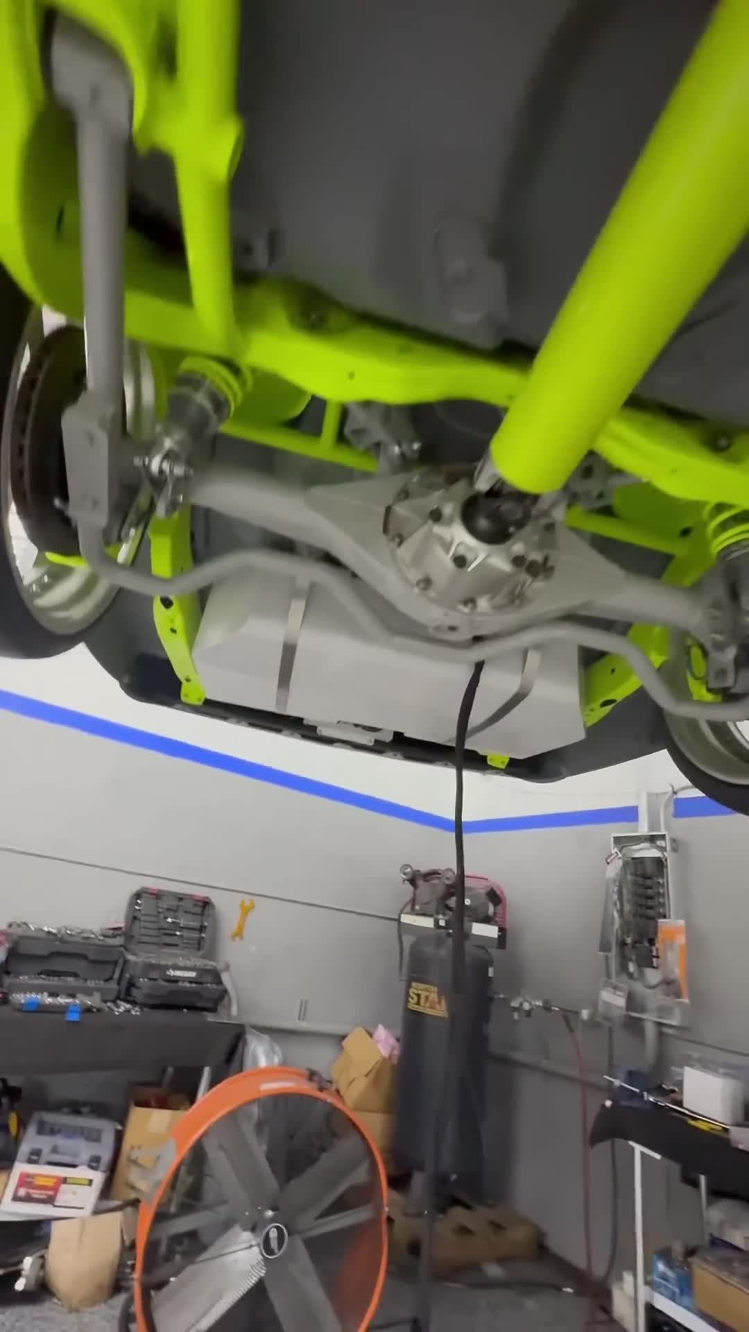 Frame-off Chevy Impala in the lab at Blue Magic Built