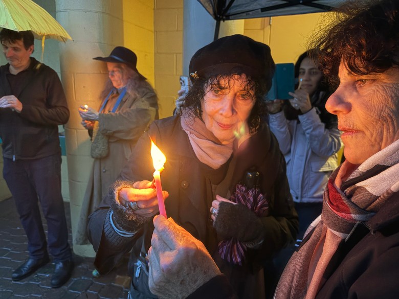 Final night of Hanukkah brings light to Alex Thomas Plaza amid heavy rain