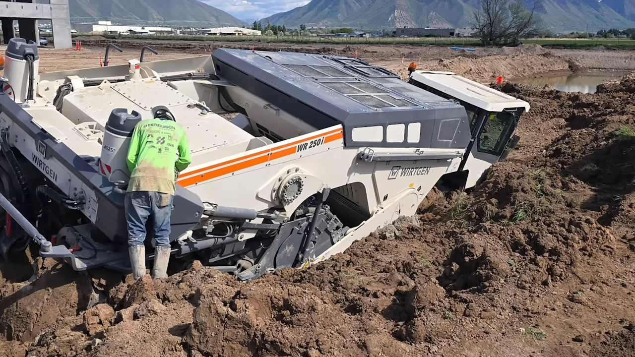 We're going to need the big guns - when a $1 million machine gets buried