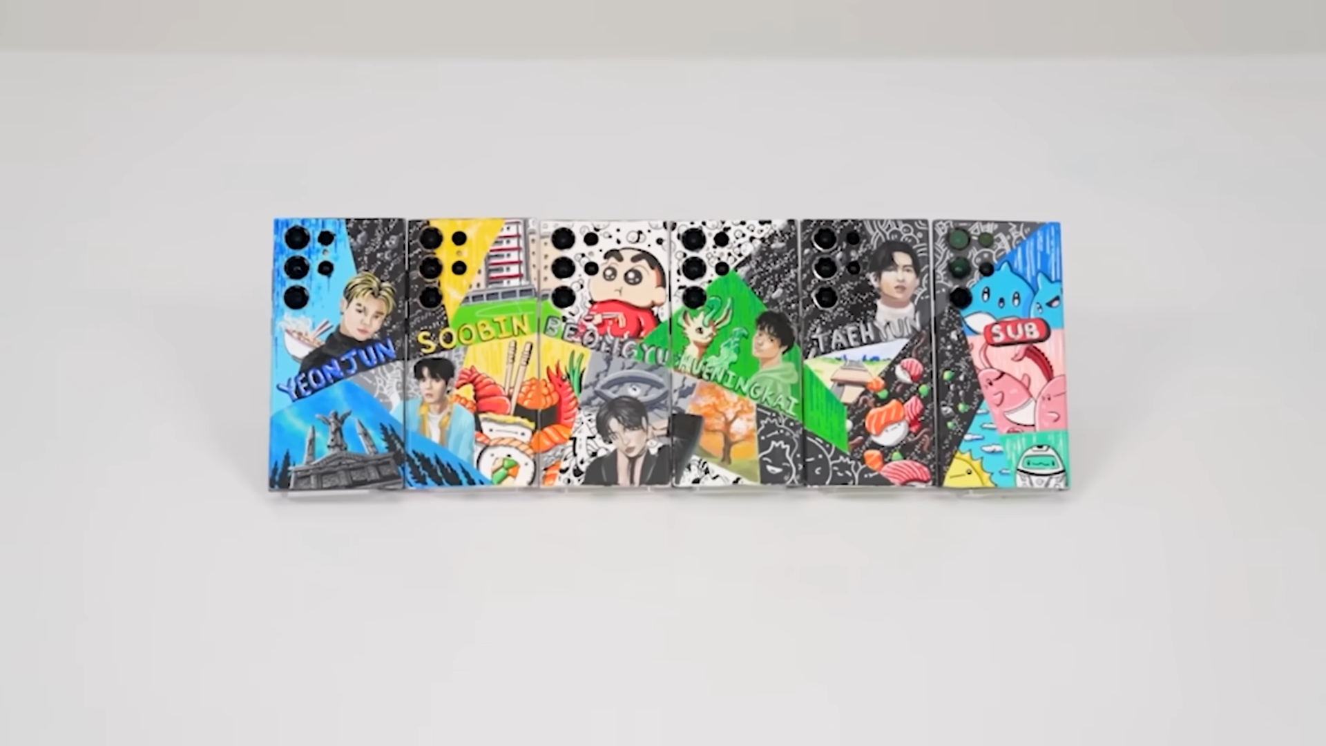 Surprising TXT with custom phone murals