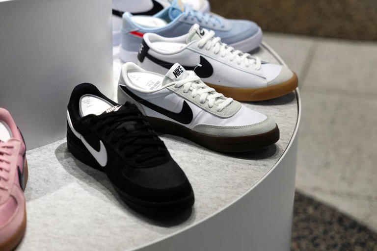 Apple's Cook doubles Nike stake, endorses CEO Hill's turnaround push