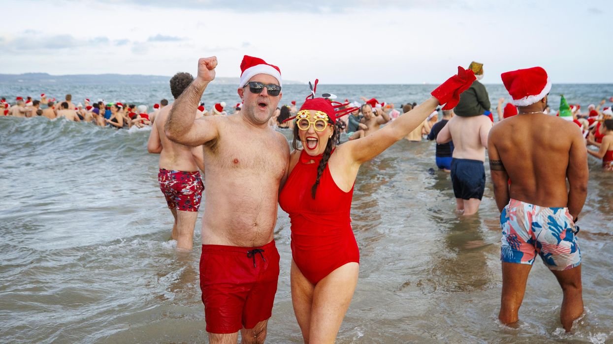 Hundreds brave the cold to make a splash for charity