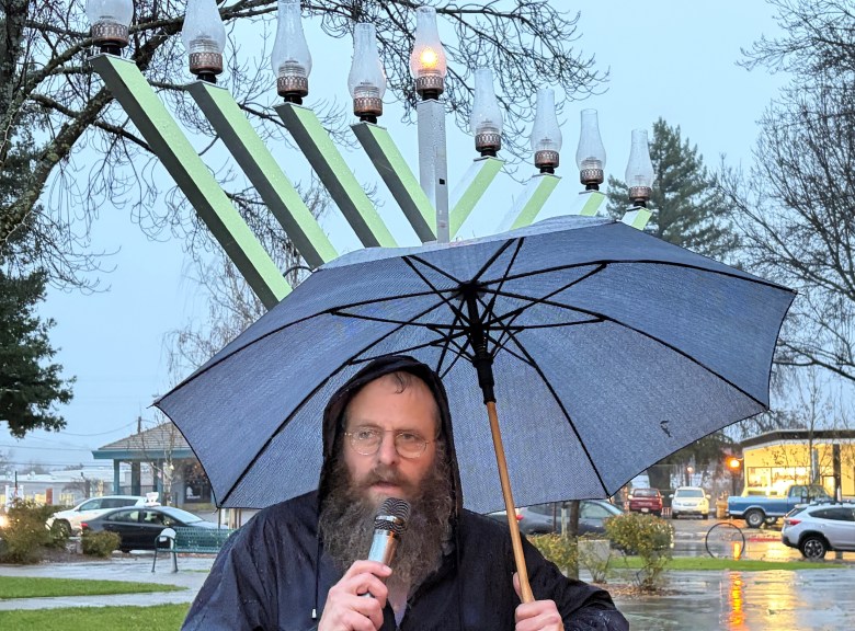 Final night of Hanukkah brings light to Alex Thomas Plaza amid heavy rain