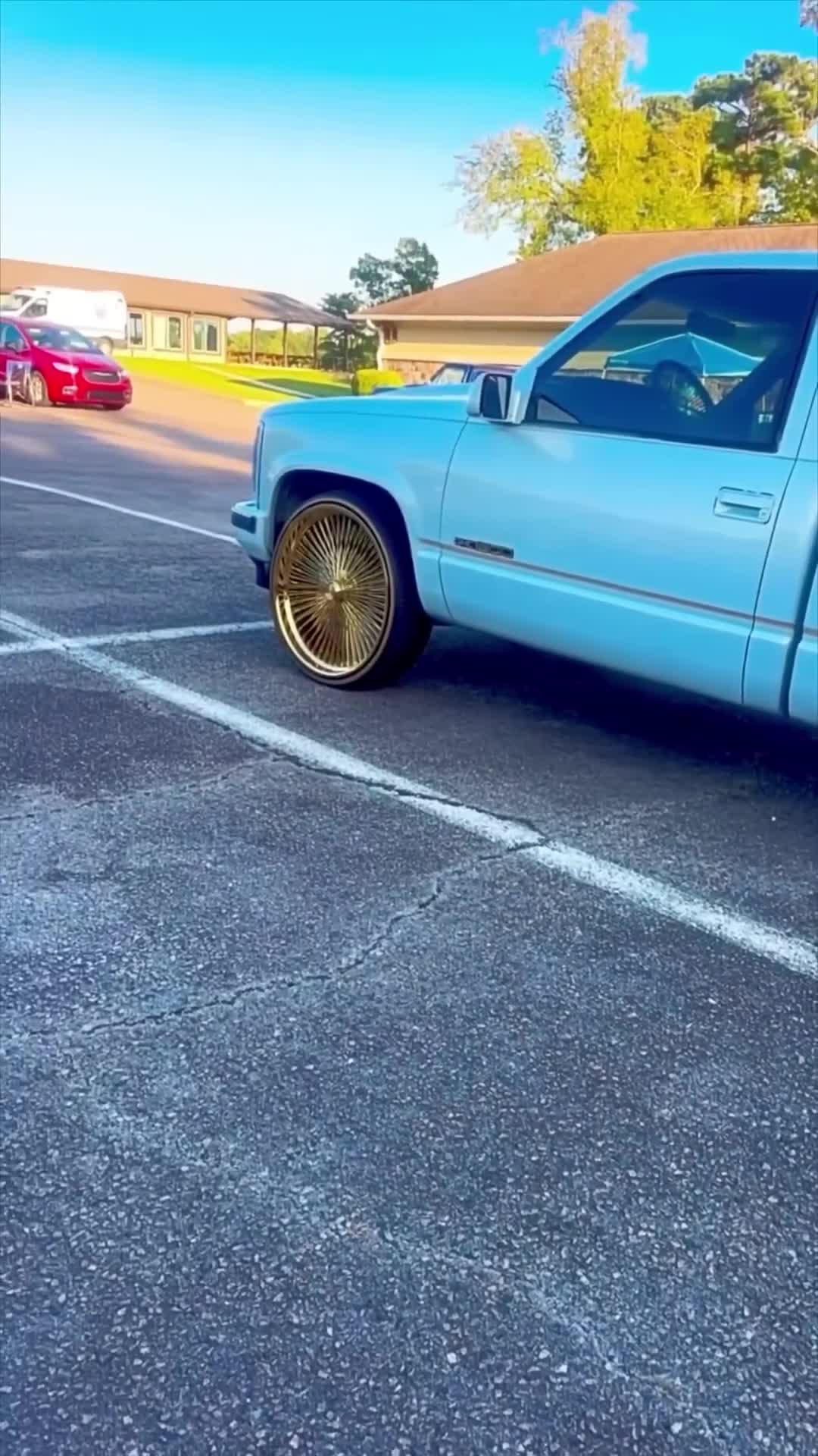 White GMC 1600 Truck On Gold 26's Wire Wheels