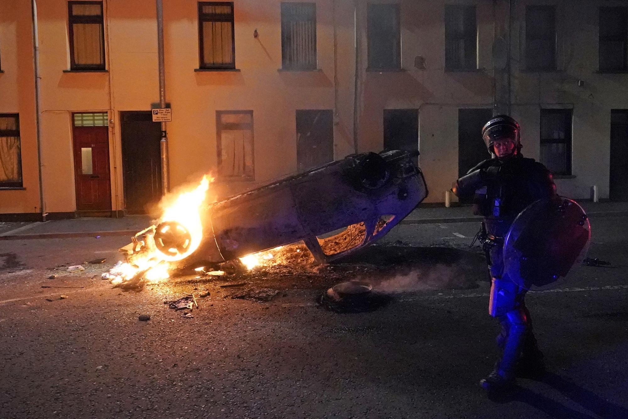 Ballymena man who threw masonry at police during riots is jailed for ...