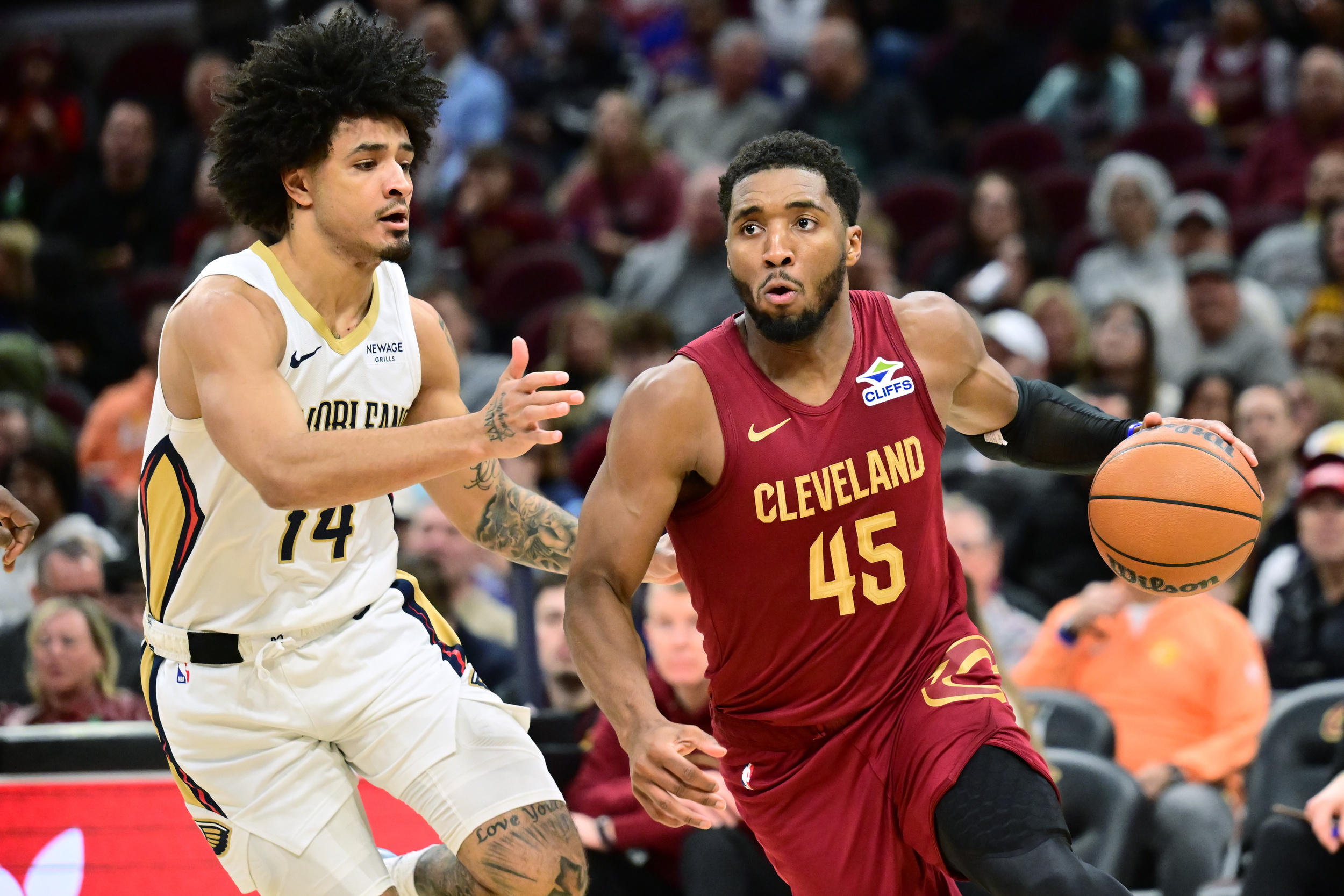 Donovan Mitchell, Sam Merrill drive Cavs by Pelicans