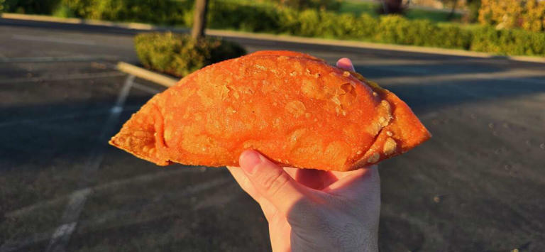 Bright orange, crunchy empanadas are sweeping the internet. Here's ...