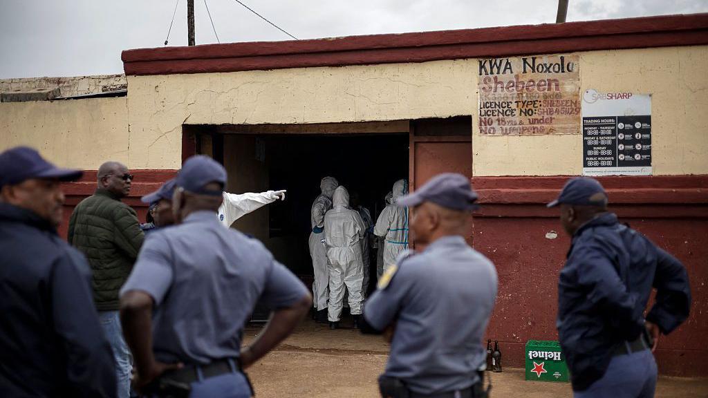 Eleven arrested over mass shooting in South Africa tavern