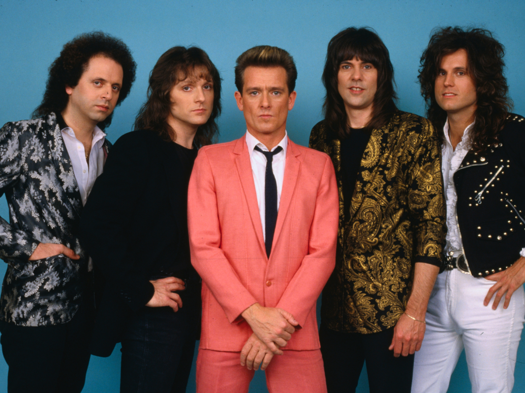 '80s rock legend says former band is trying to 'destroy' him with lip ...