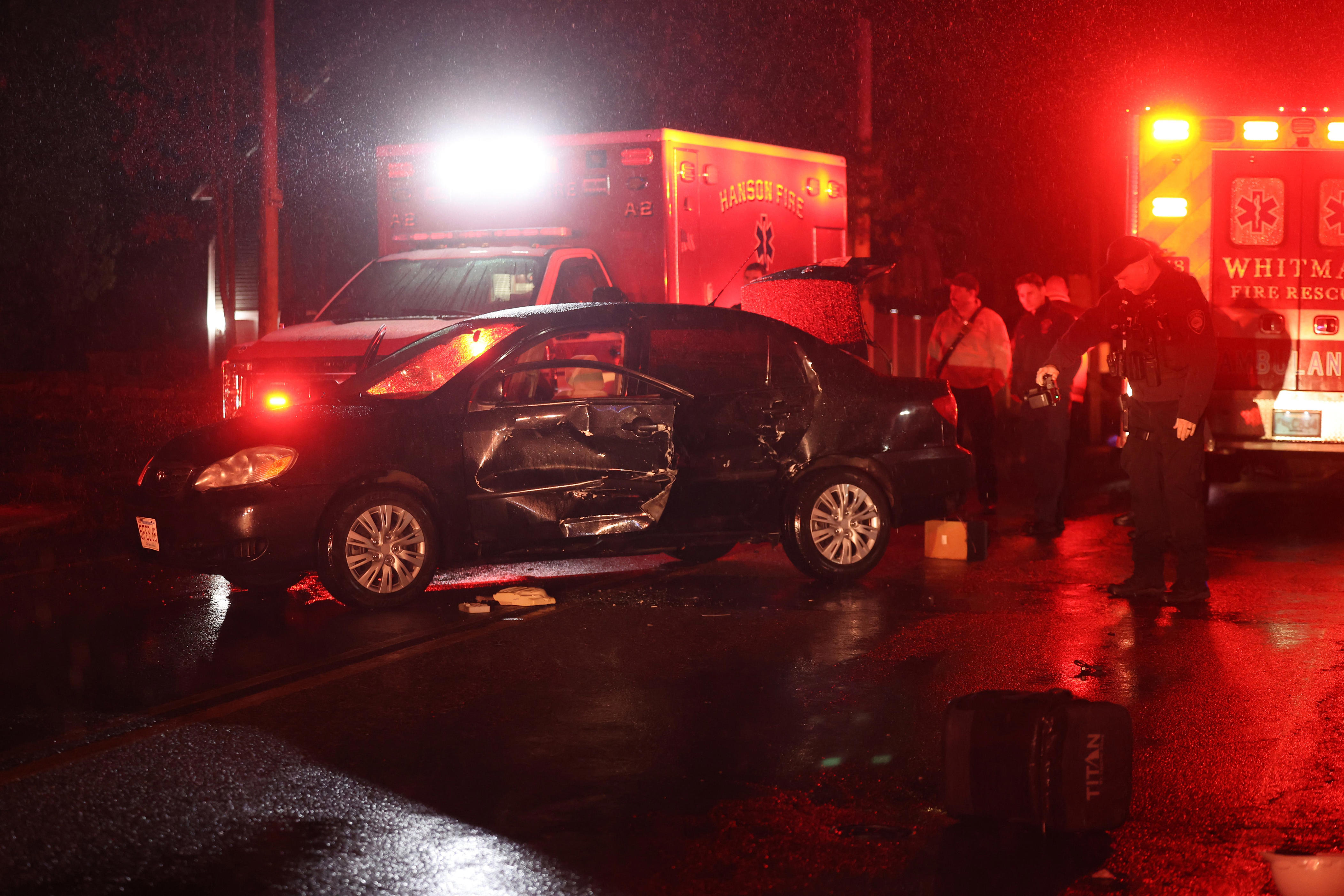 Hanson ambulance and car collide, 2 children pried from sedan