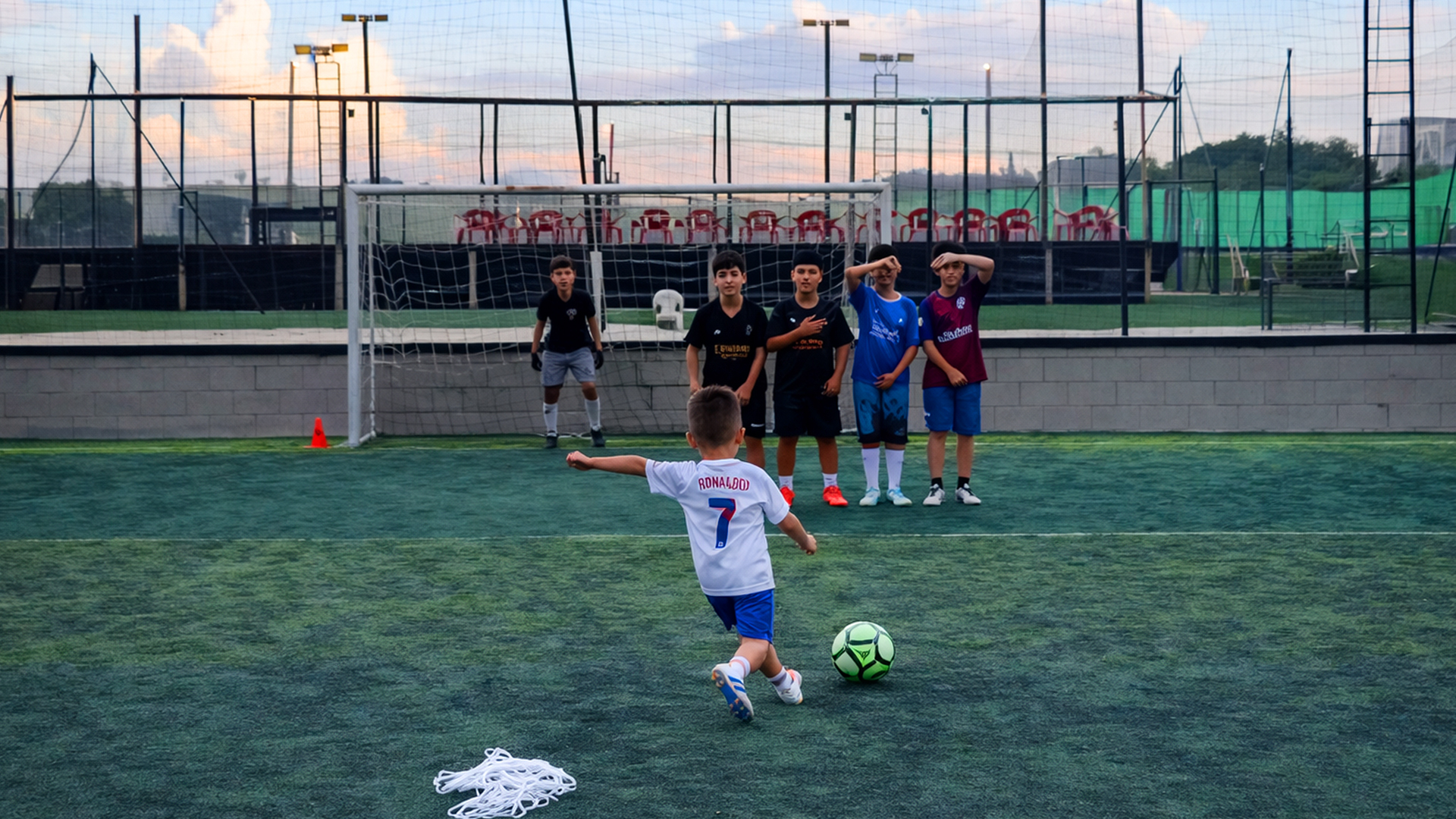 Epic free kick by a kid in football