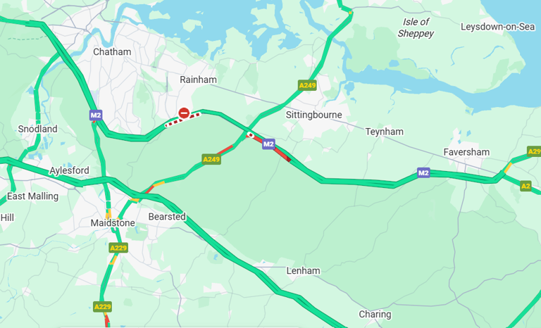 Drivers walk along the motorway after serious crash