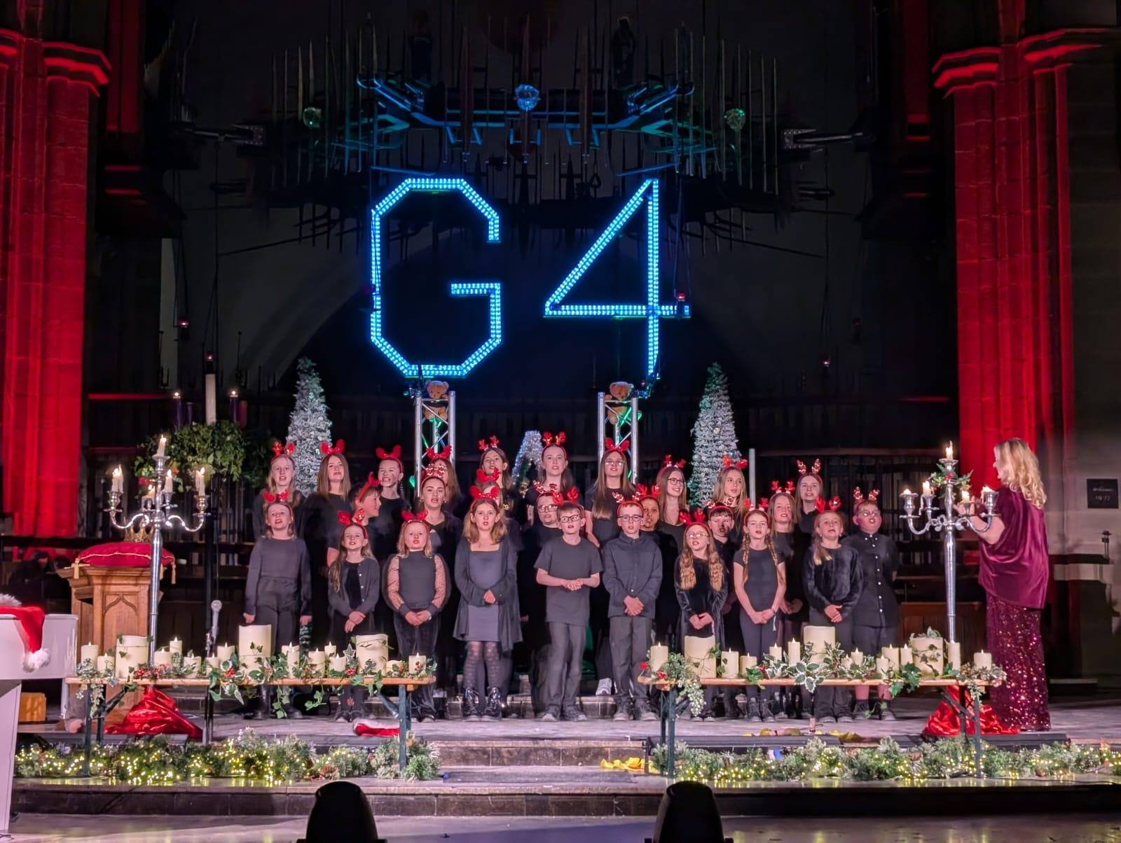 Truly magical: Preston youngsters perform with the band G4 at Blackburn ...