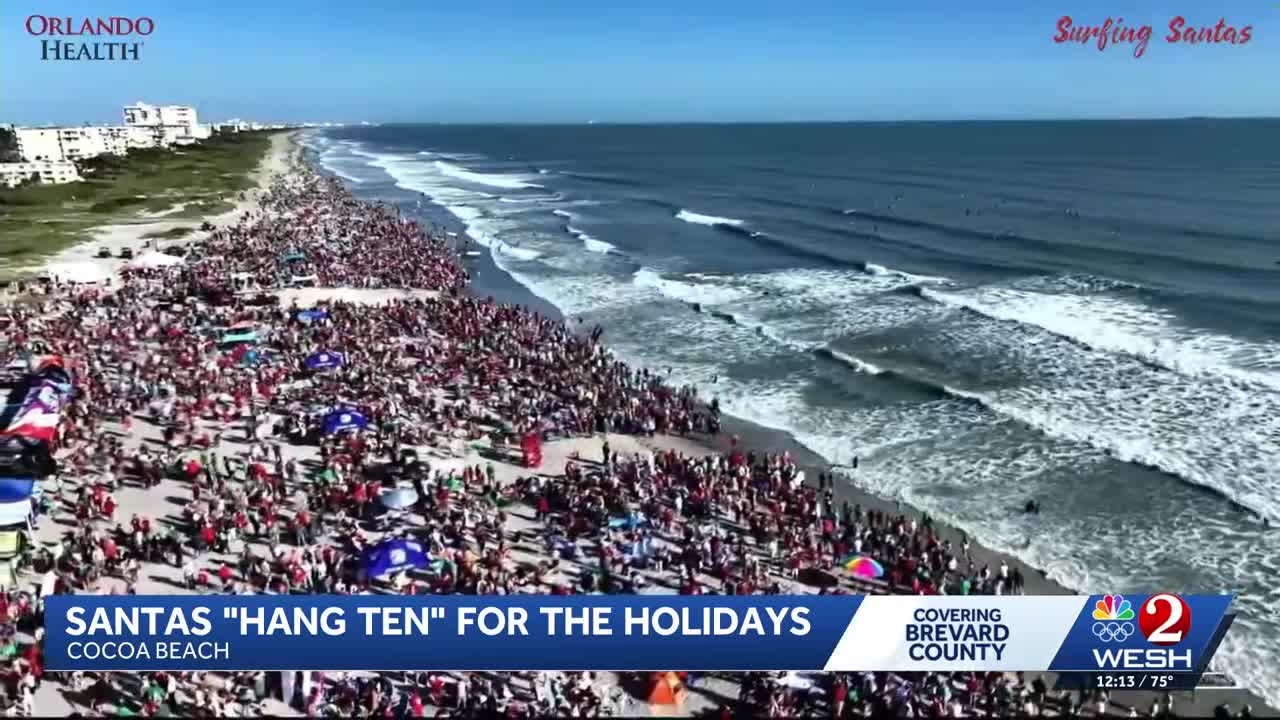 Hundreds of Santas take over Cocoa Beach in annual surfing event