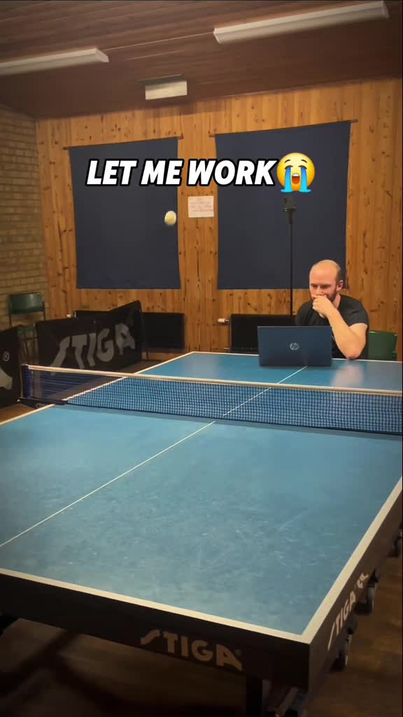 Trying to work while getting ambushed at the ping pong table